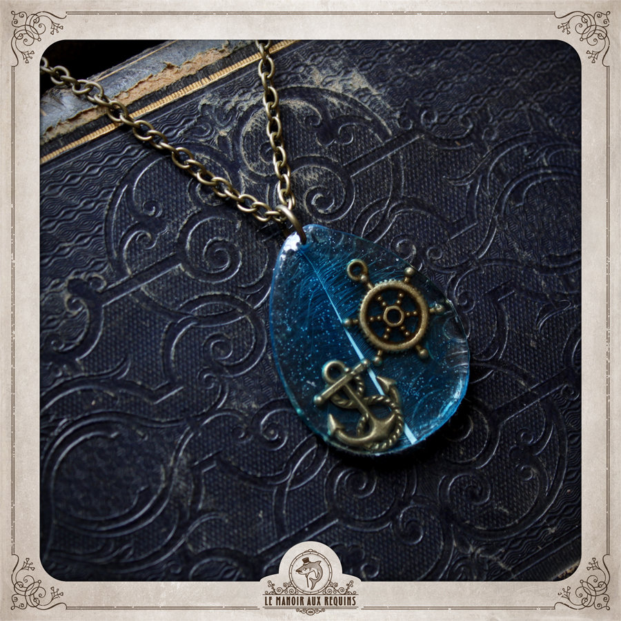 STEAMPUNK nautical necklace, brass and resin and real blue feather ...