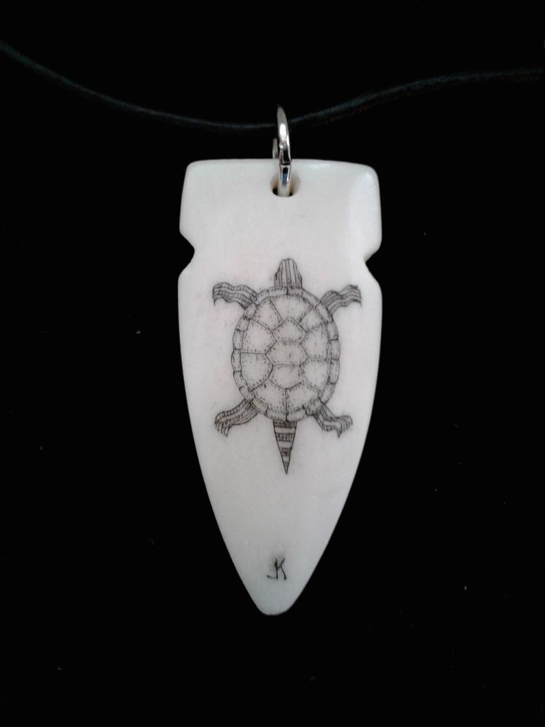 arrowhead shaped turtle scrimshaw on bone | Schooner Chandlery