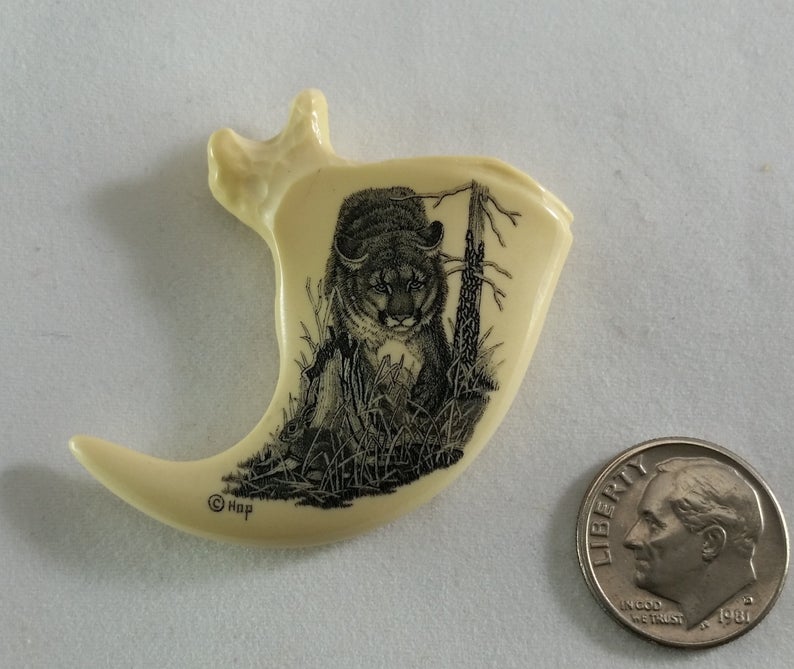 Mountain Lion on Claw with Rabbit by: Hop, Reproduction Polymer ...